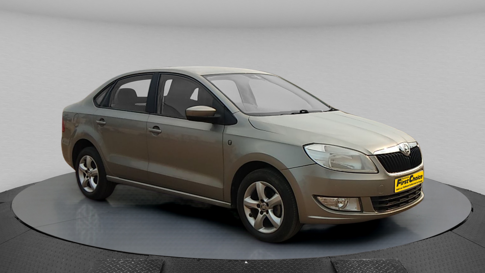 Skoda Rapid Ambition 1.6 Mpfi Mt - Mahindra First Choice